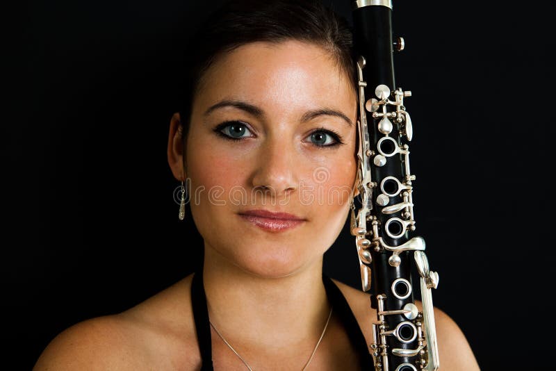 Mujeres Hermosas Del Clarinetist Imagen de archivo - Imagen de fondo ...