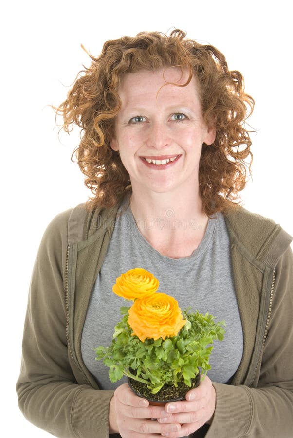 A Mulher Cheira a Planta Amarela Imagem de Stock - Imagem de presente ...