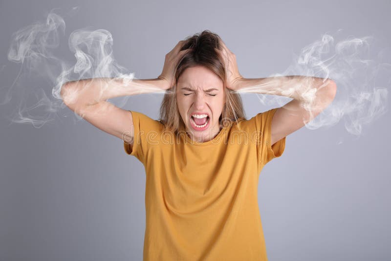 Mulher Jovem, Estressada E Aborrecida, Em Claro Cinza Foto de Stock ...
