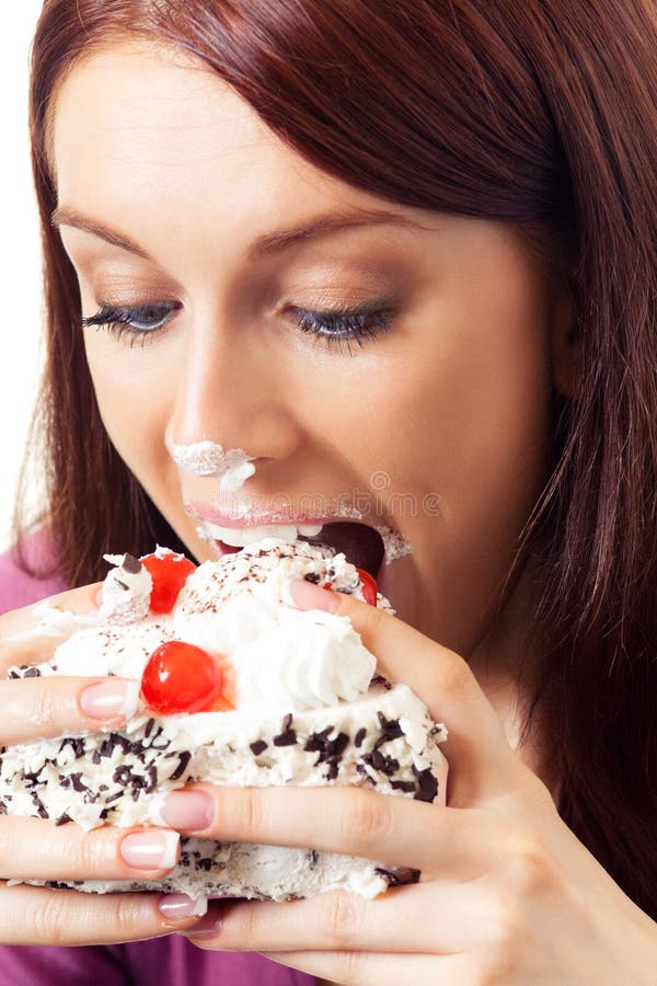 Mulher que come a torta imagem de stock. Imagem de creme - 20802093