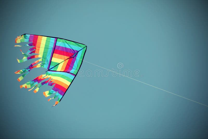 Multcolored Kite on the Blue Sky with Vivid Colors Stock Image - Image ...