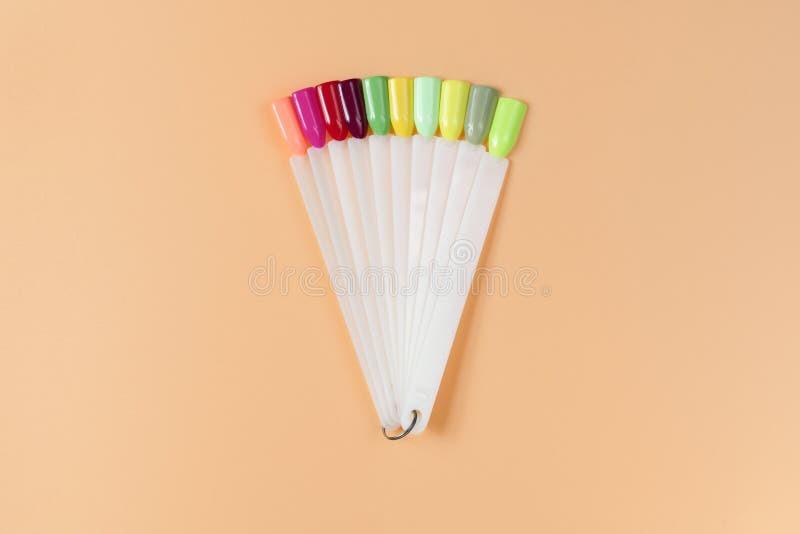 MultiÑ olor Nail Tips on a Orange Background. Examples of Manicure for ...