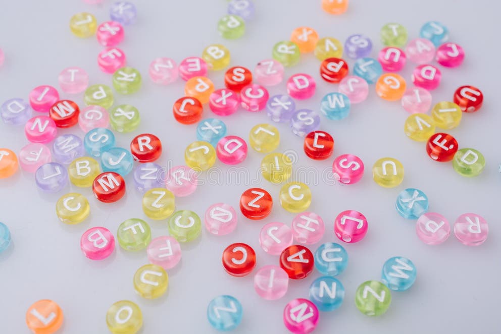 Multi Color Alphabet Letter Beads Placed Randomly Stock Image - Image ...