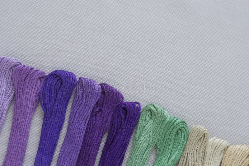 Multi-color Embroidery Threads on White Canvas. Place for Text Stock ...