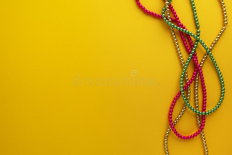 Multi Color Mardi Gras Beads on Paper Background. Top View Stock Image ...