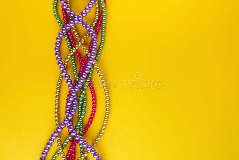 Multi Color Mardi Gras Beads on Paper Background. Top View Stock Image ...