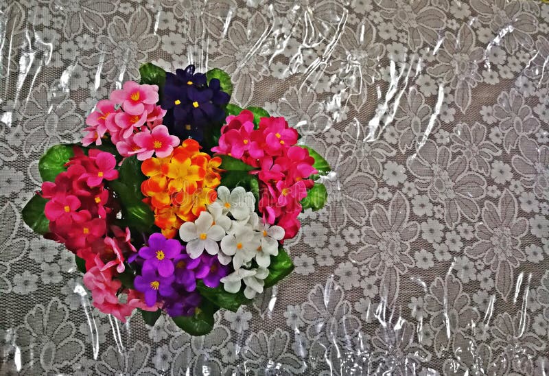 Multi Color of Plastic Flowers for Decorations on Office Table Stock ...