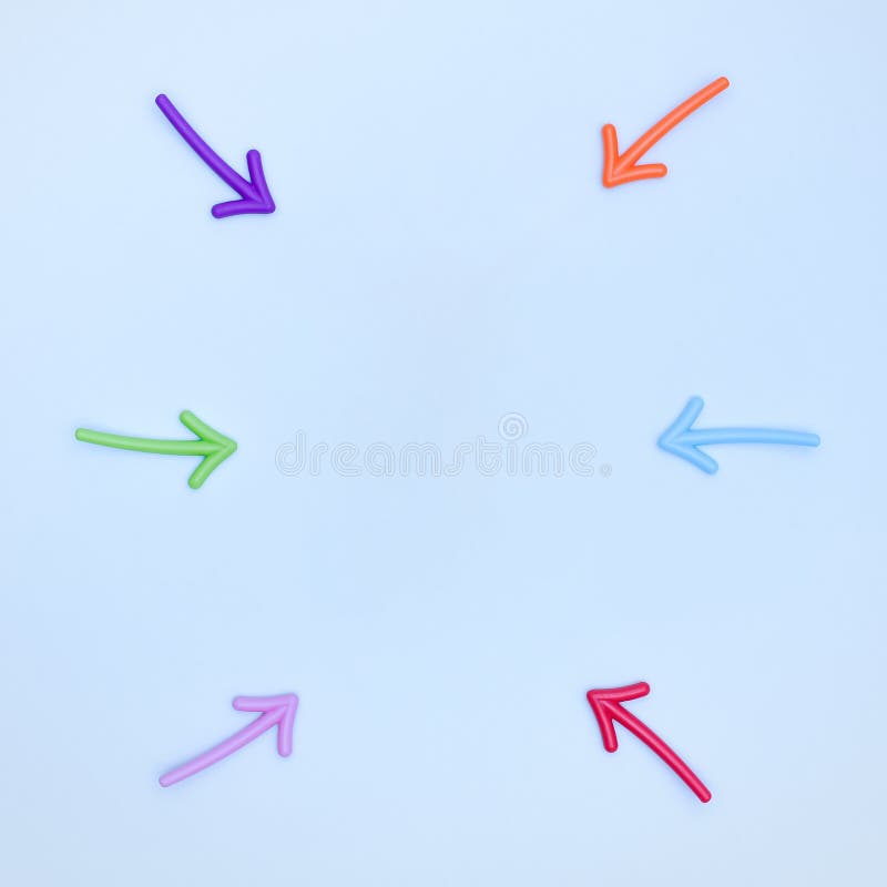 Multi-colored Arrows Pointing To the Area between Them on a Light Blue ...