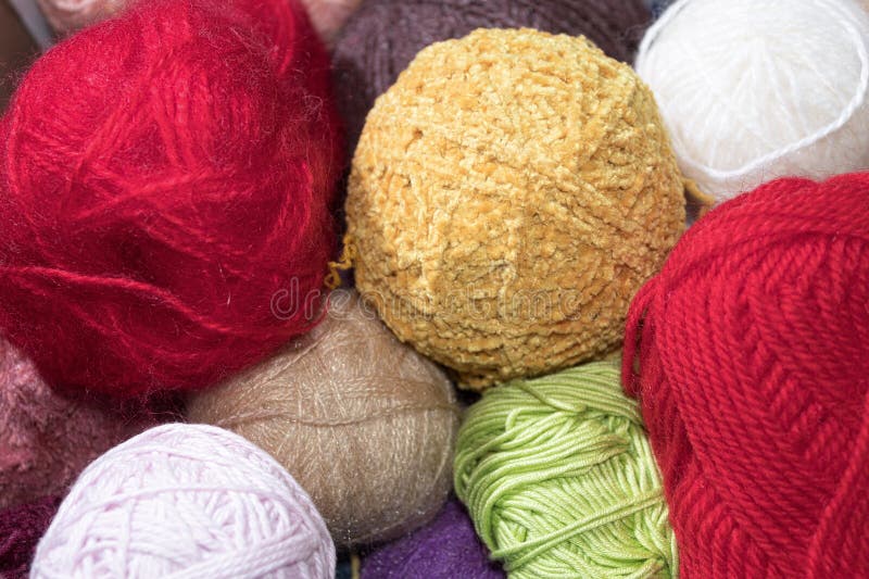 Multi-colored Balls of Knitting Threads. Balls of Colored Yarn Stock ...