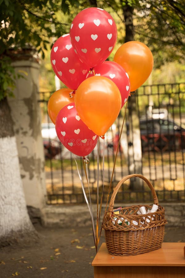 Multi-colored Balls Stand in a Basket on a Table Stock Photo - Image of ...