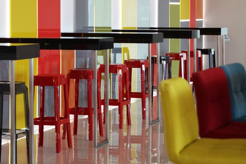 Multi-colored Bar Stools in a Colorful Interior Stock Photo - Image of ...