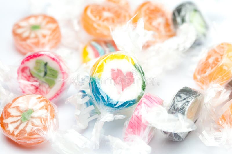 Multi-colored Candies in Shiny Wrappers Stock Image - Image of brown ...