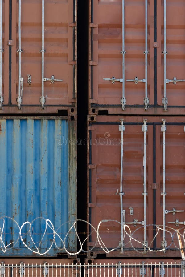 Multi Colored Cargo Containers Behind the Wire Fence Stock Image ...