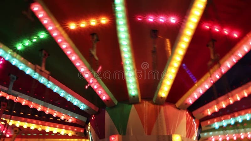 Multi-colored Carousel Lights at a Fair in the Evening Stock Video ...