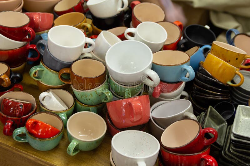 Multi-colored Ceramic Mugs on the Counter Stock Photo - Image of ...