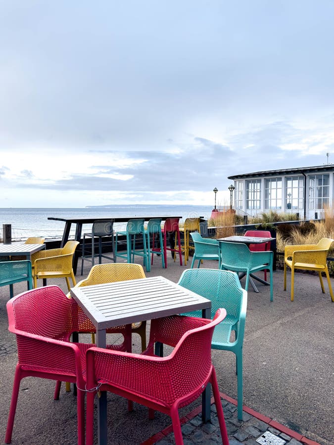 Multi-colored Chairs on the Terrace of a Cafe by the Sea. Stock Photo ...