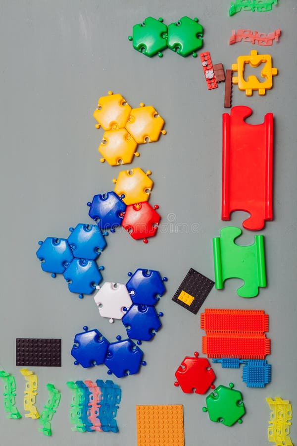 Multi-colored Children`s Developing Game Designer on a Gray Background ... Multi-colored Children`s Developing Game Designer on a Gray Background ...
