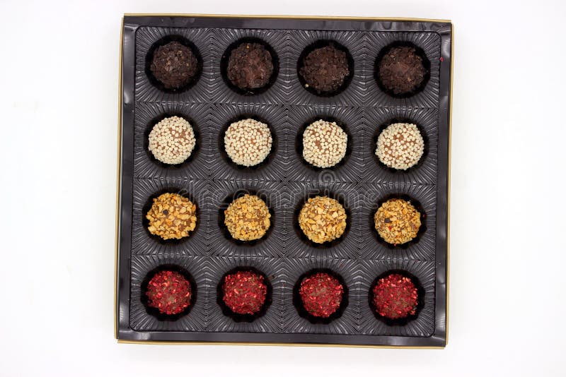 Multi-colored Chocolates in Dark Packaging Stock Image - Image of ...