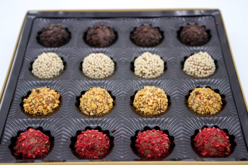 Multi-colored Chocolates in Dark Packaging Stock Image - Image of ...