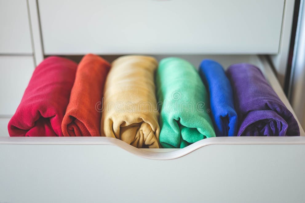 Multi-colored Clothes Folded Vertically in a Wardrobe Drawer. the ...