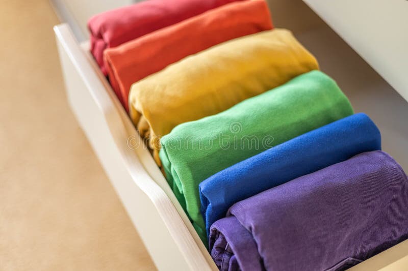 Multi-colored Clothes Folded Vertically in a Wardrobe Drawer. the ...