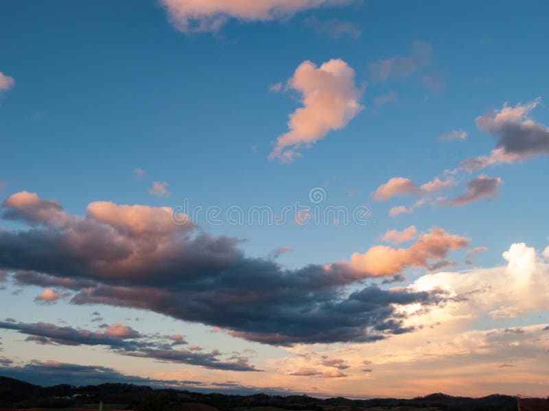 Multi-Colored Clouds in a Dramatic Sky at Sunset Stock Image - Image of ...