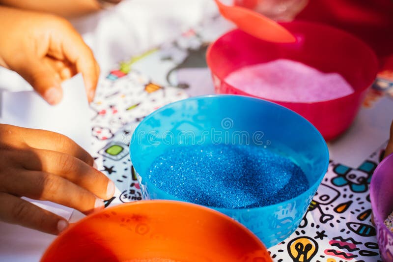Multi-colored Containers with Multi-colored Sand and Small Pebbles for ...