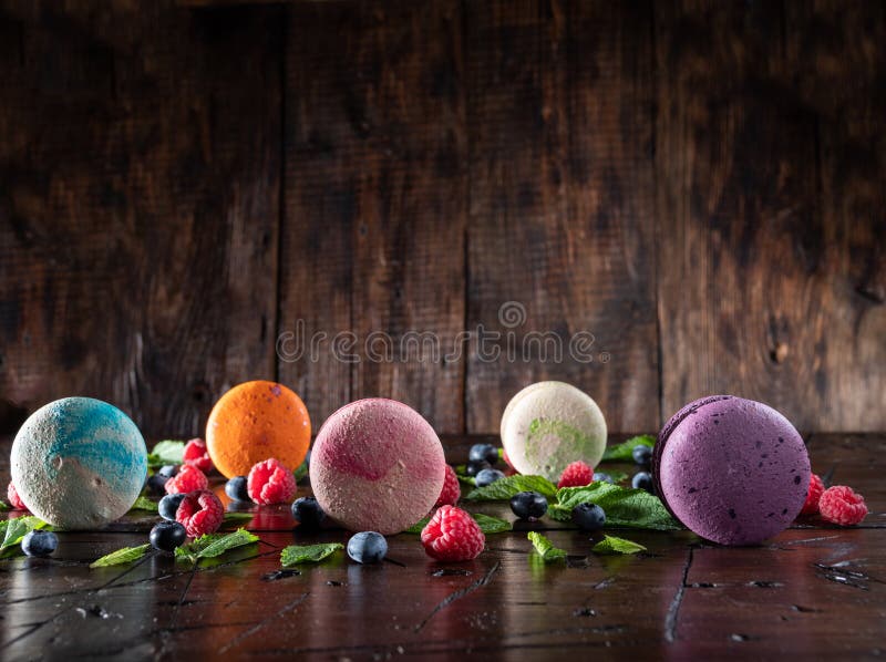 Multi-colored Cookies with Berries and Leaves. Scattered Cookies on the ...