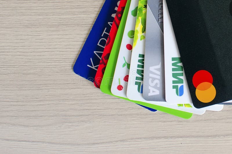 Multi-colored Credit and Debit Cards of Different Banks Lie on the ...