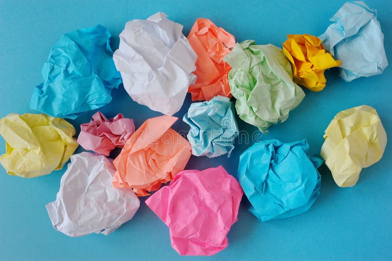 The Multi-colored Crumpled, Crumpled Paper on a Blue Background. Stock ...