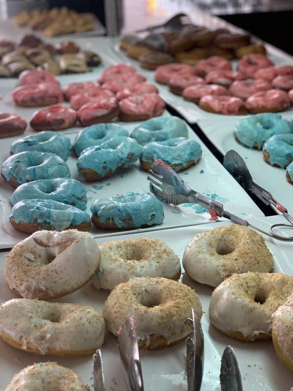 Multi Colored Donuts on Buffet Table Stock Image - Image of market ...