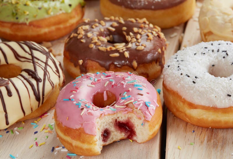 Multi-colored donuts stock photo. Image of gourmet, glazed - 109071122