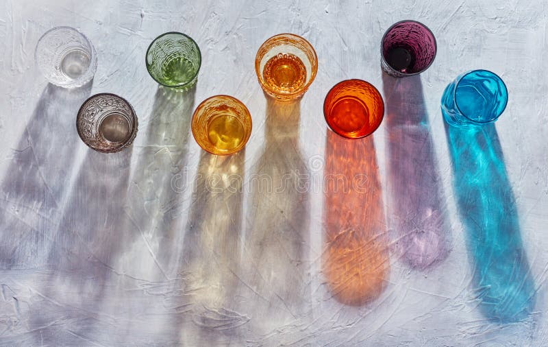 Multi-colored Drinking Glasses with Reflections Stock Photo - Image of ...