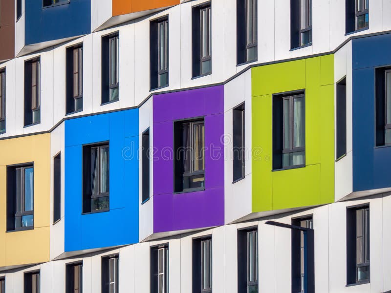 The Multi-colored Facade of a High-rise Residential Building. Rows of ...