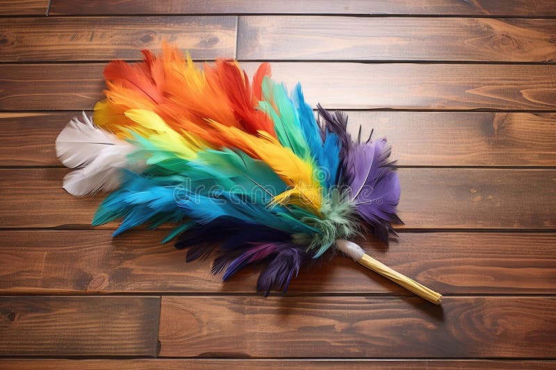 A Multi-colored Feather Duster on a Wooden Surface Stock Illustration ...