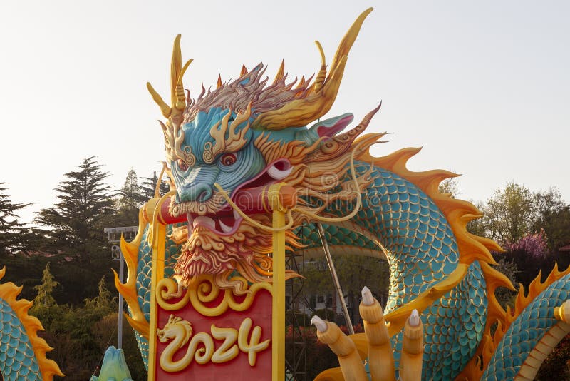 Multi-colored Figure of a Chinese Dragon with a Scroll in Its Mouth ...