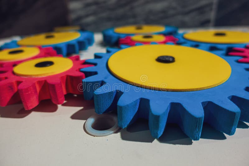 Multi-colored Gears of Different Diameters Rotate Stock Image - Image ...