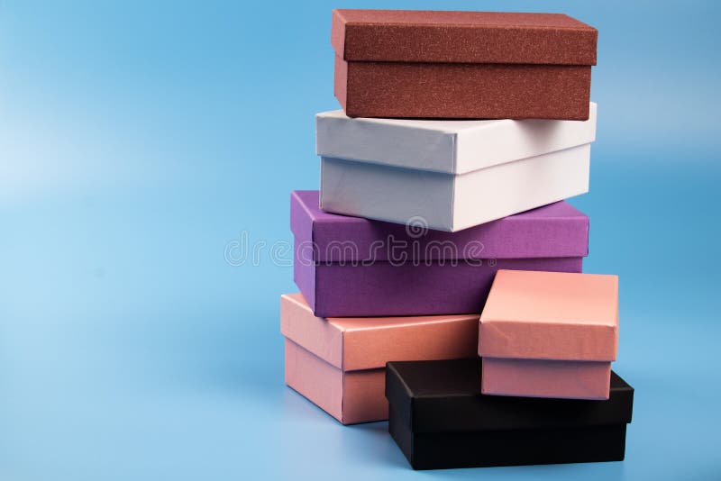 Multi-colored gift boxes stock image. Image of brown - 163945619