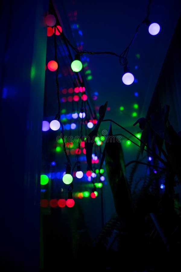 Multi-colored Glare from Garlands in the Dark Stock Image - Image of ...