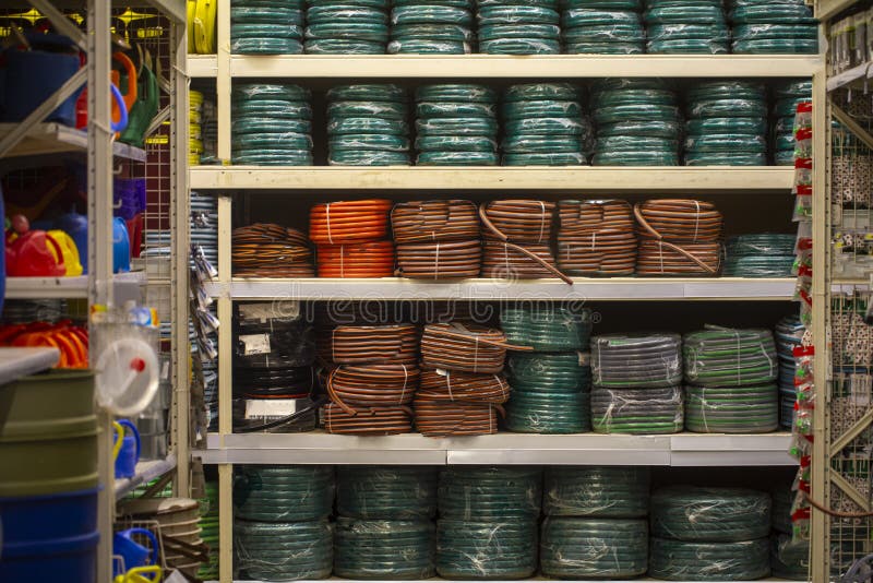 Multi-colored Hose Packaging on the Shelves Stock Image - Image of pile ...