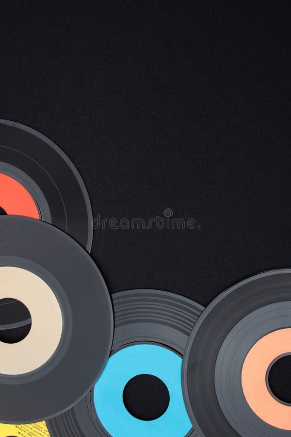7 Inch Single Vinyl Records on Black Background Placed on Bottom Left ...