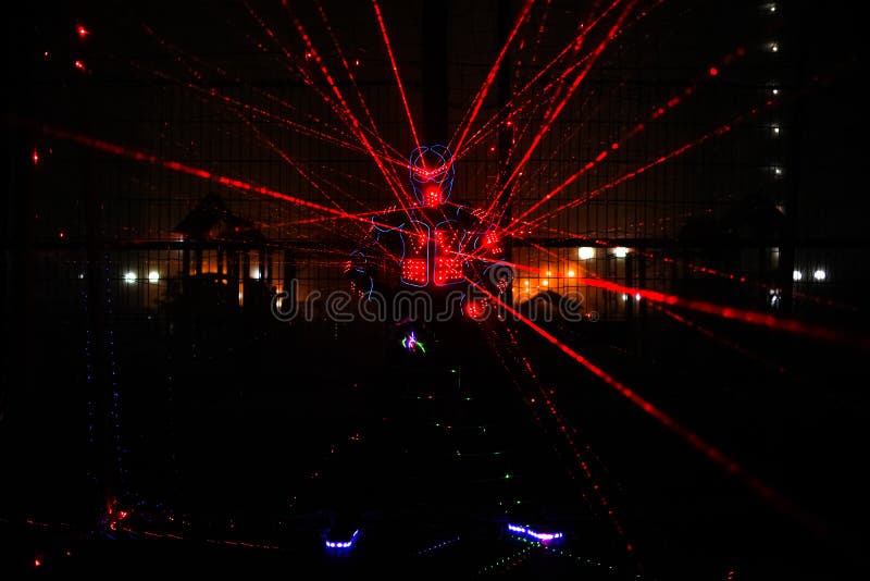 Multi-colored Laser Beams. Man Laserboy Stock Photo - Image of beams ...