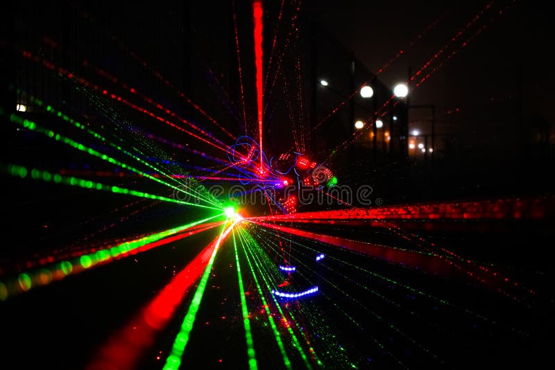 Multi-colored Laser Beams. Man Laserboy Stock Image - Image of ...