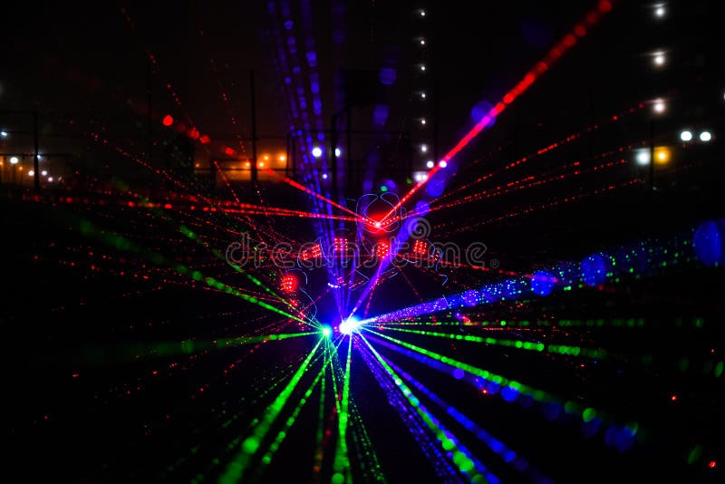 Multi-colored Laser Beams. Man Laserboy Stock Image - Image of ...