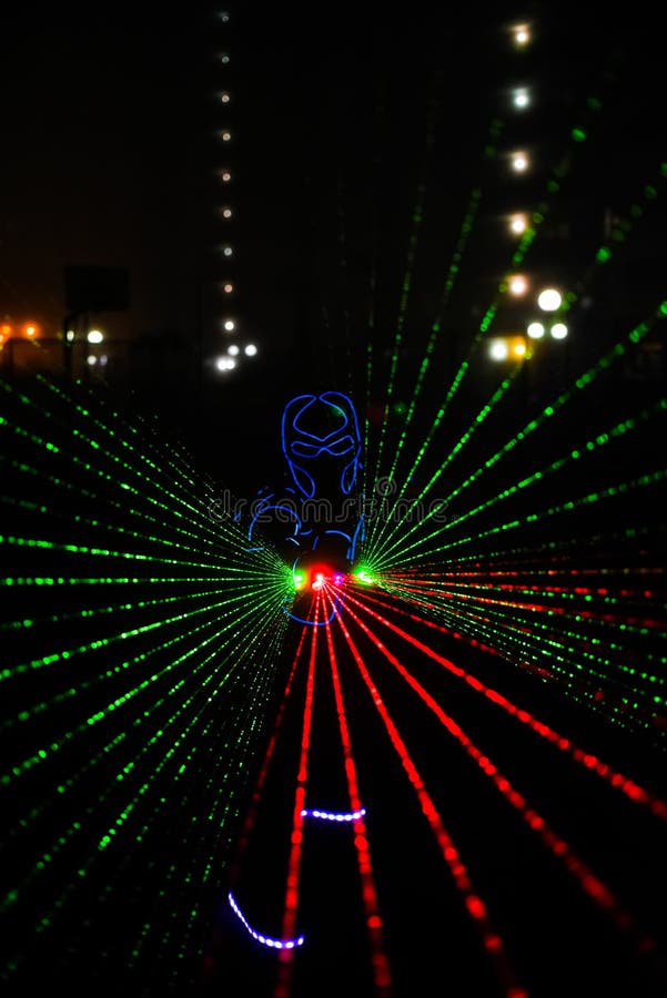 Multi-colored Laser Beams. Man Laserboy Stock Image - Image of night ...
