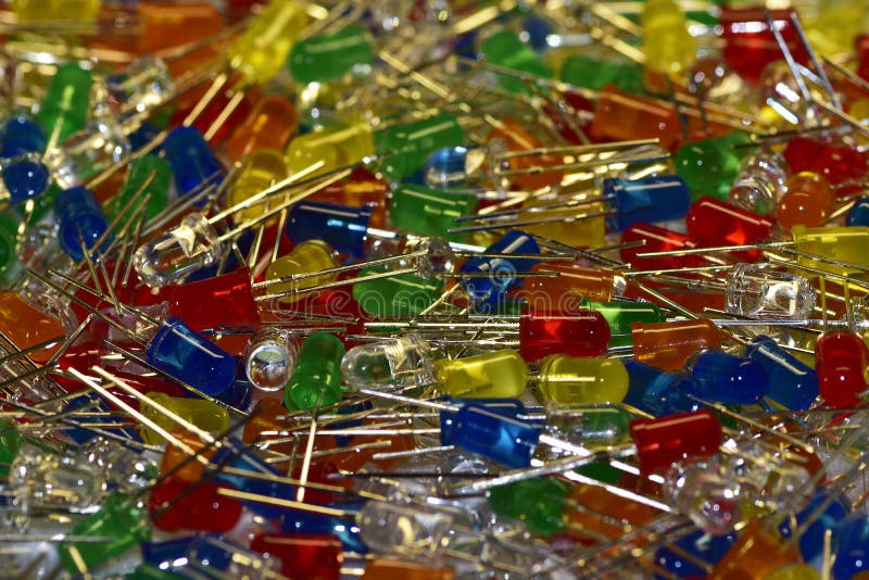Multi-colored Low-power LEDs are Poured into a Round Glass Container ...