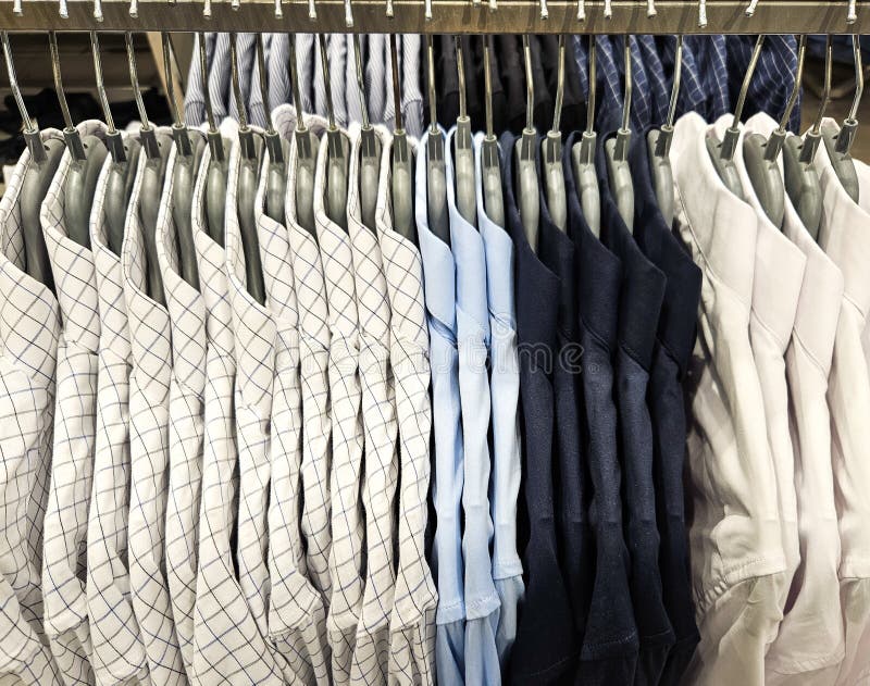 Multi-colored Men S Shirts on Hangers in a Store or Store Stock Photo ...