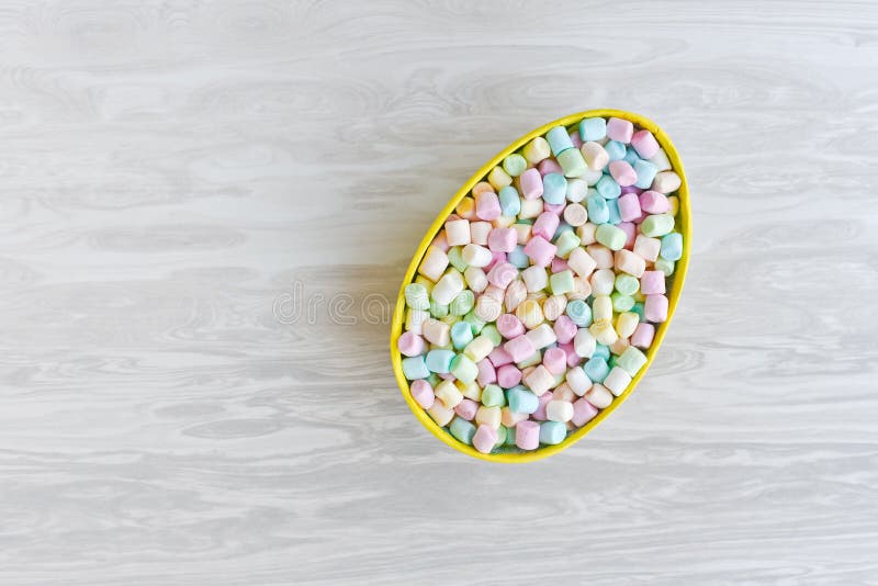 Multi Colored Mini Marshmallows in Decorative Easter Egg Stock Image ...