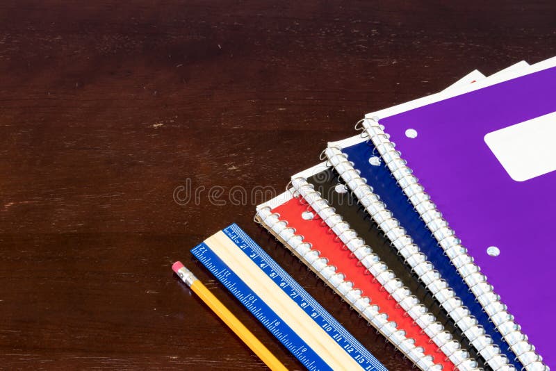 Multi Colored Notebooks Ruler and Pencil on a Table Stock Image - Image ...