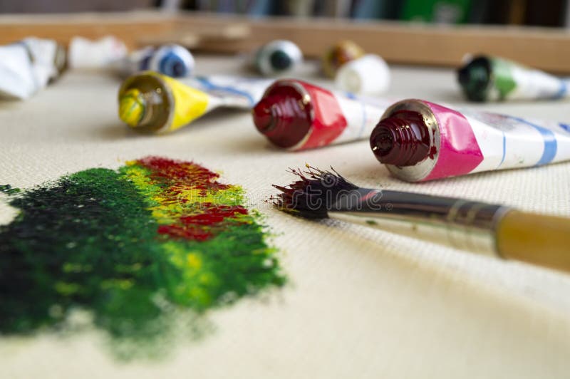 Multi-colored Paint and Brush on Canvas Stock Photo - Image of paints ...